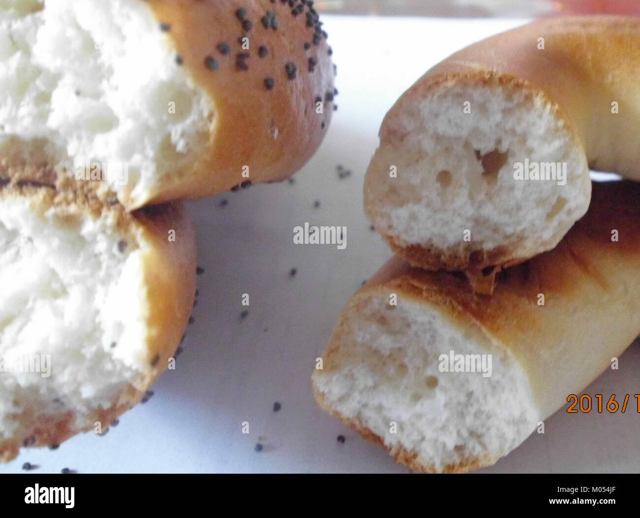 This image features two types of traditional Russian bread: bublik and ...