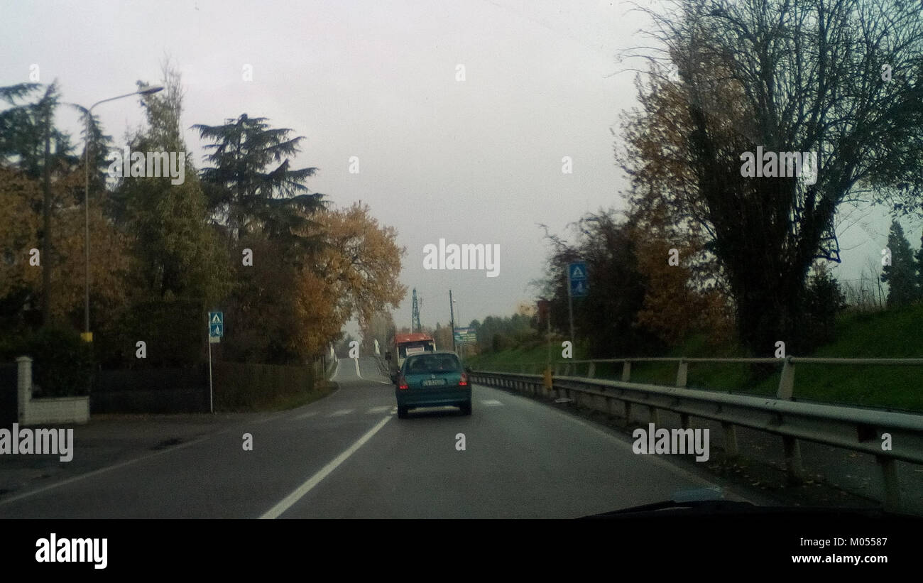 The image features a Canali suit, a luxury brand known for its fine ...