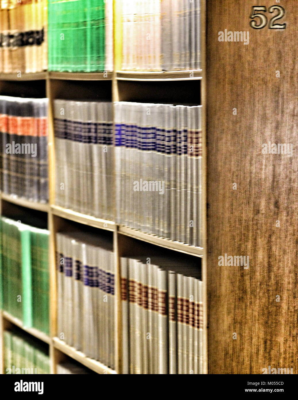 A photograph showcasing Canadian law books on a shelf, illustrating the ...