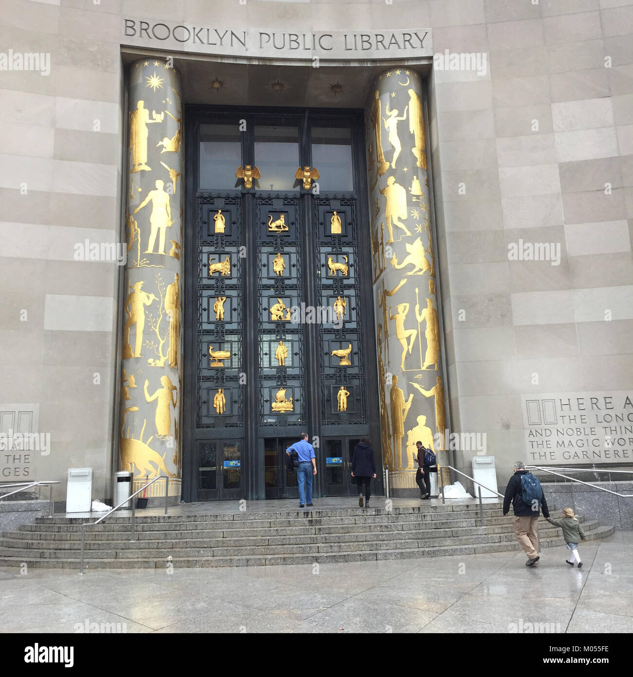 This image captures the BPL (Boston Public Library) gold entrance, an ...