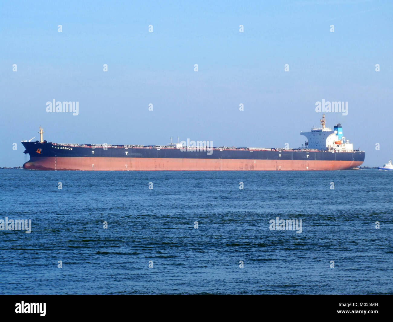 The image captures the C H S Cosmos vessel (IMO 9377937) departing from ...