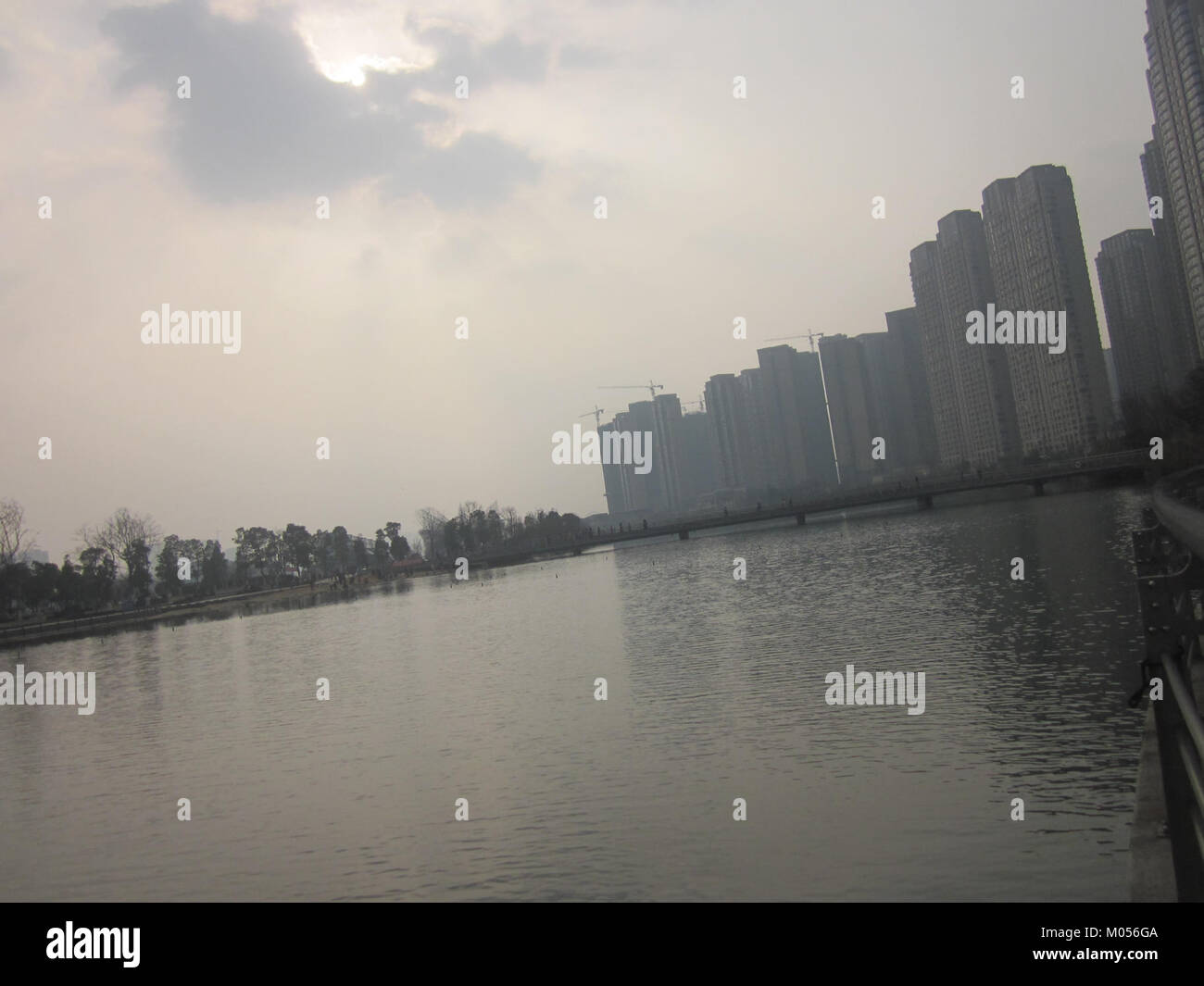 The image captures the buildings situated near Meixi Lake in Changsha ...