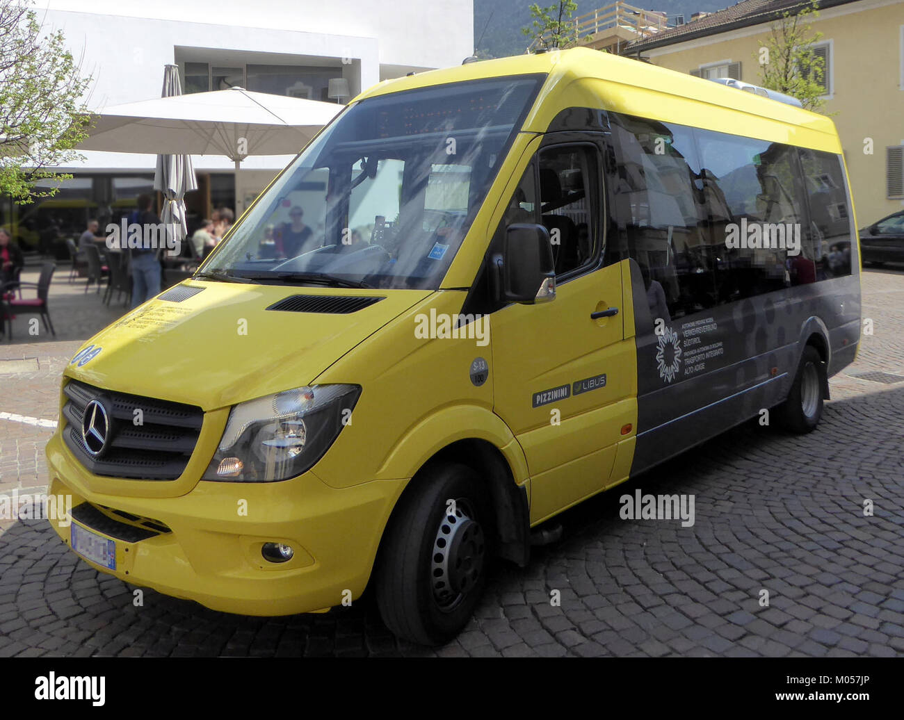 This image shows a Kleinbus, a small bus used for local transport in ...