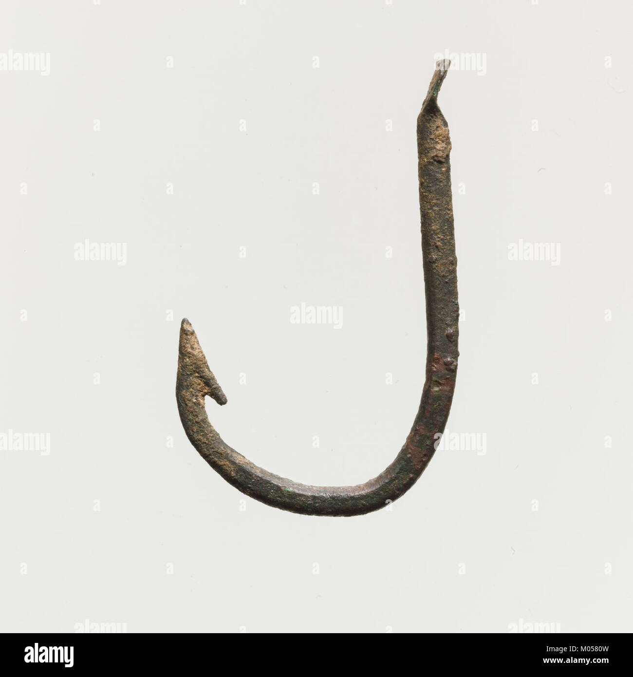 This bronze fish hook, cataloged as MET DP113072, is an ancient tool ...