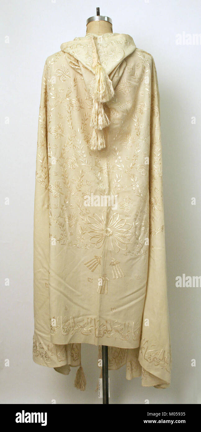 The Burnus, a traditional hooded cloak, originates from North Africa ...