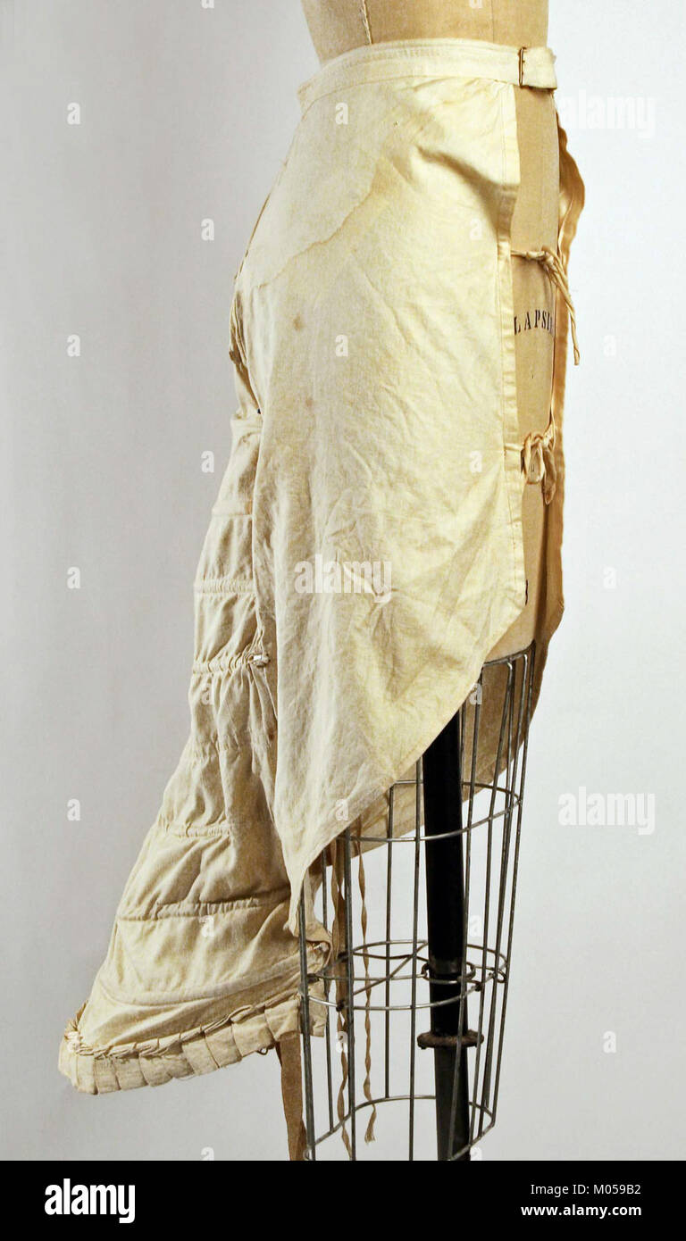 The image depicts a bustle, a historical garment accessory used in the ...