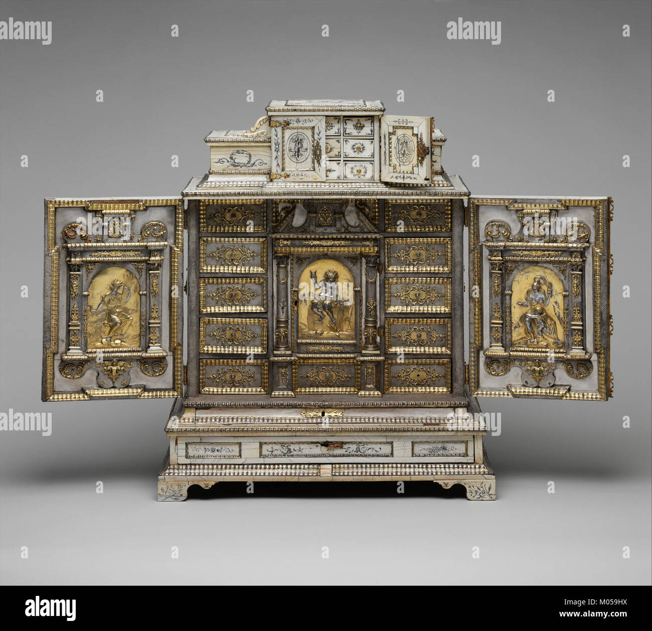 This cabinet is a notable example of fine craftsmanship, displayed at ...