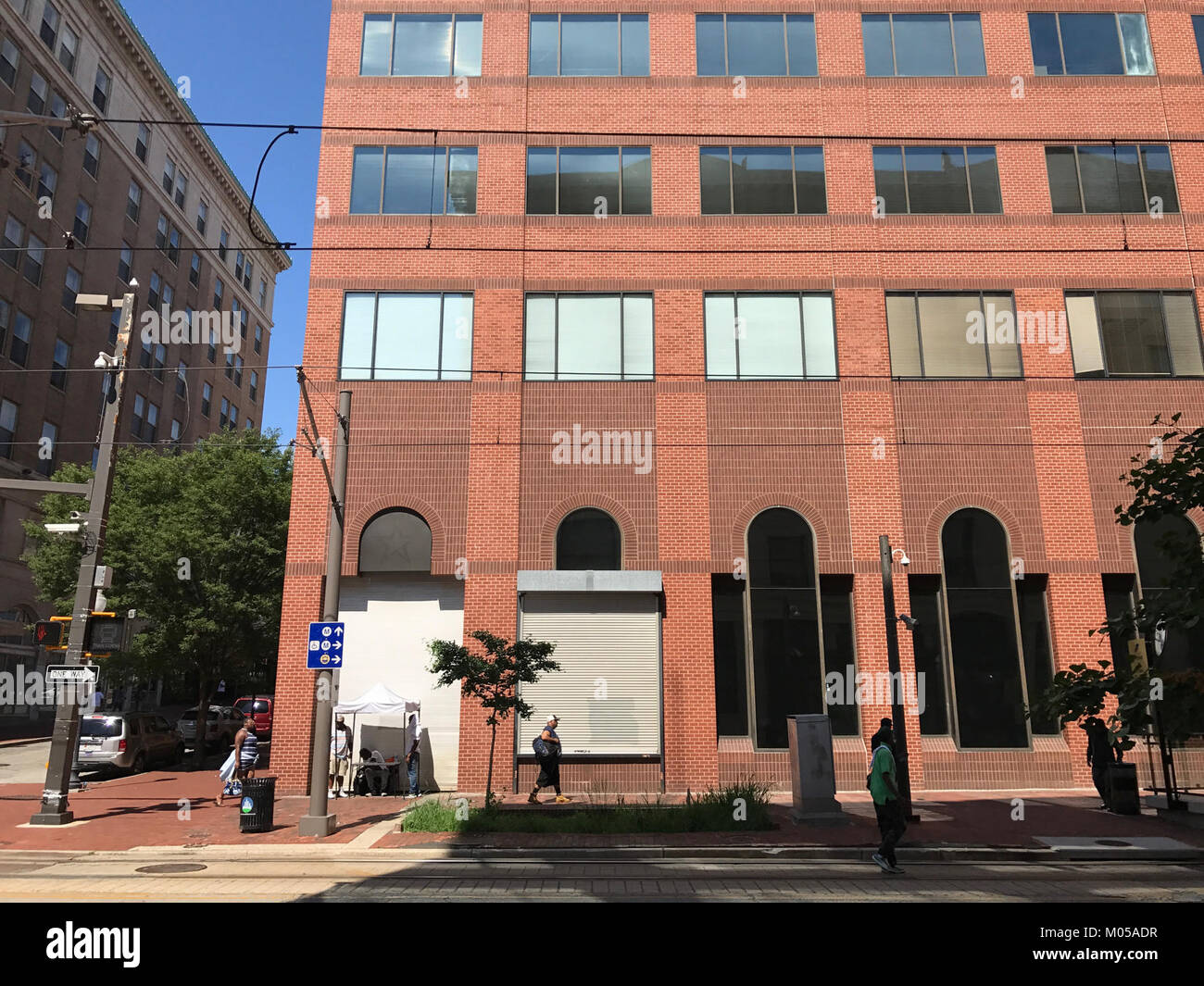This image shows buildings along Howard Street in Baltimore, Maryland ...