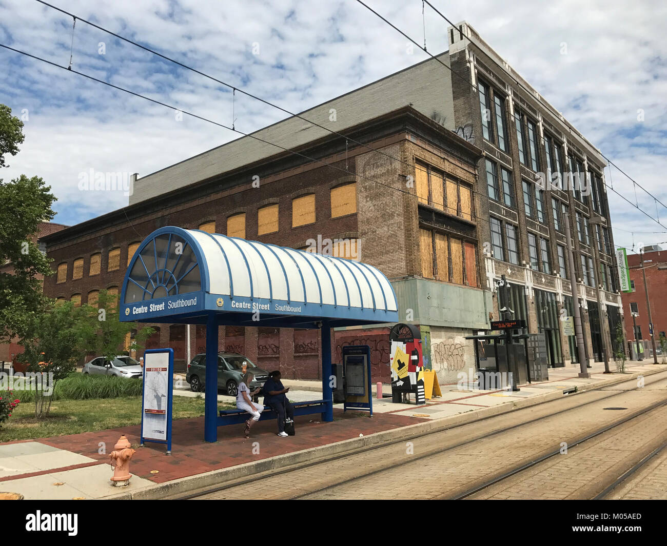 This image showcases buildings along Howard Street in Baltimore ...