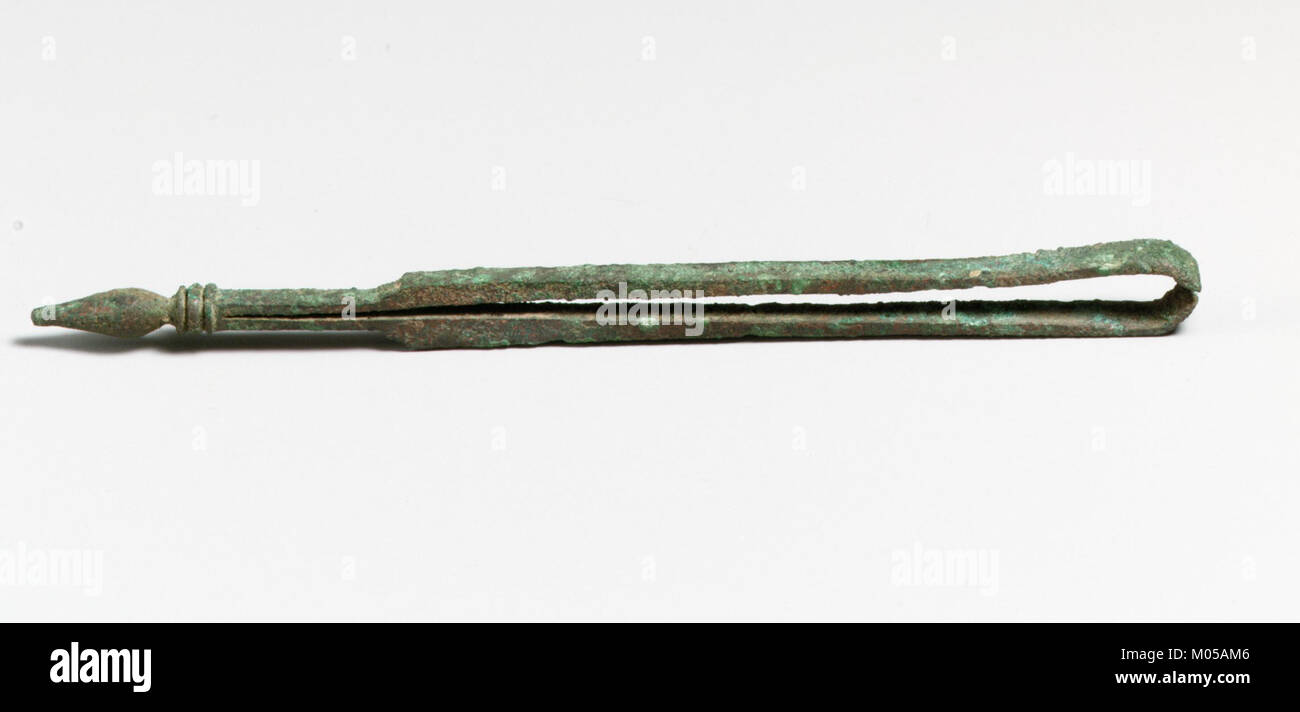 A bronze pair of forceps or tweezers, part of the MET collection ...