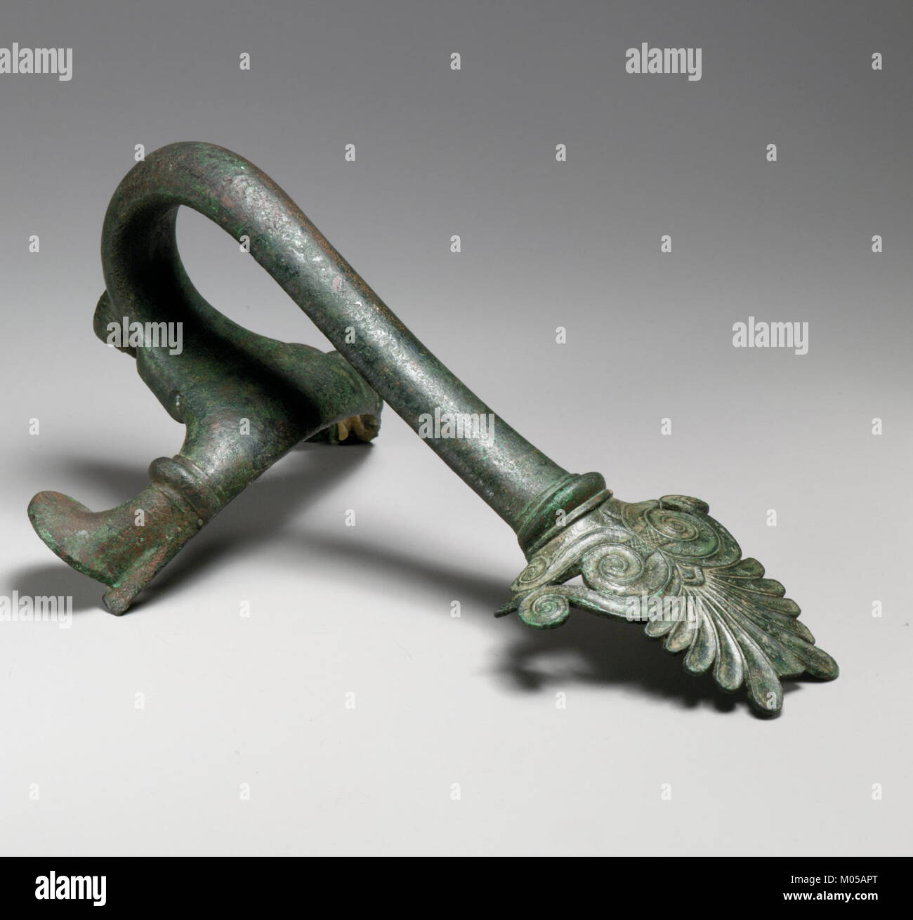 This bronze handle of a hydria, an ancient water jar, is a notable ...