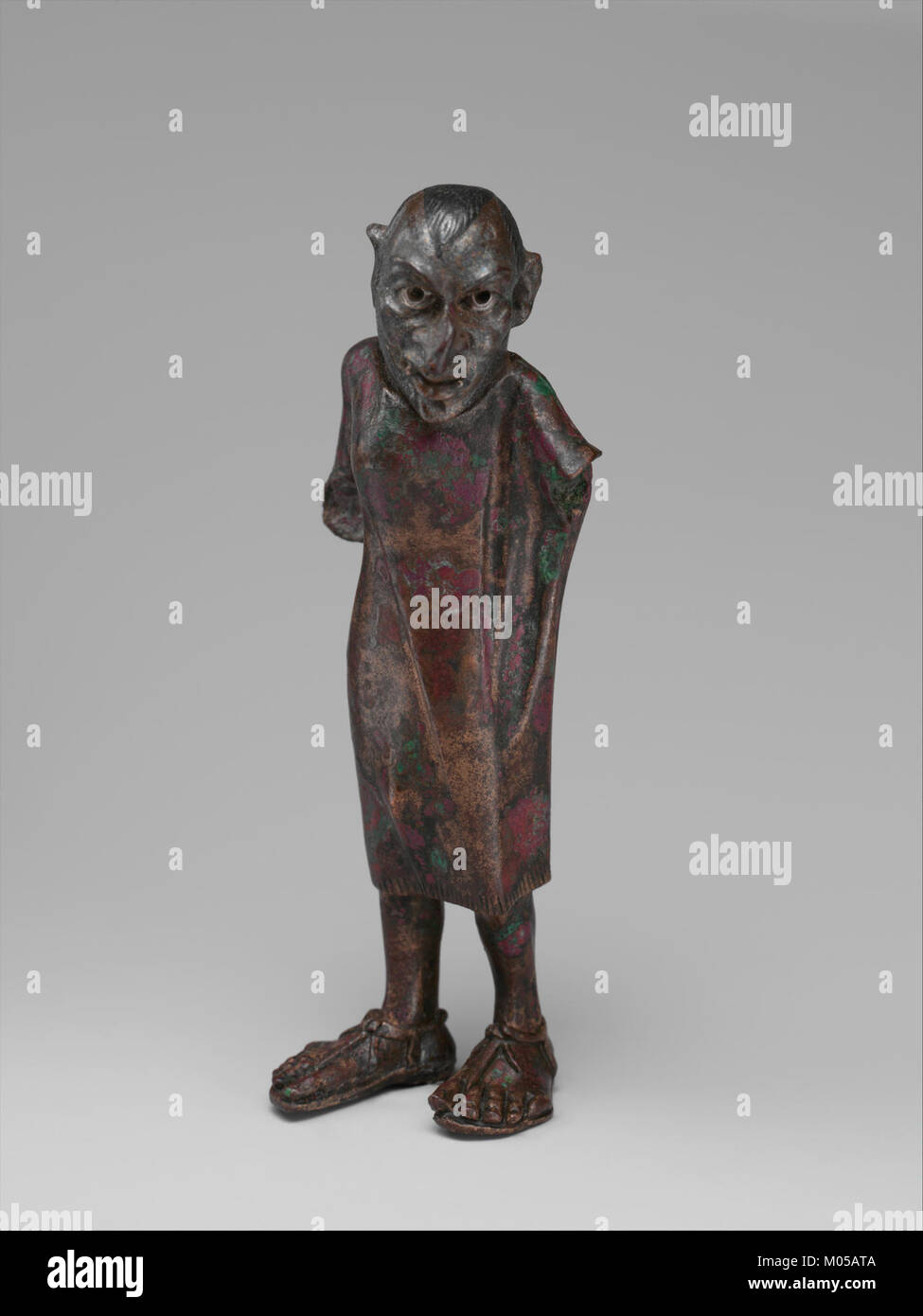 The bronze grotesque is a sculpture that depicts a fantastical ...