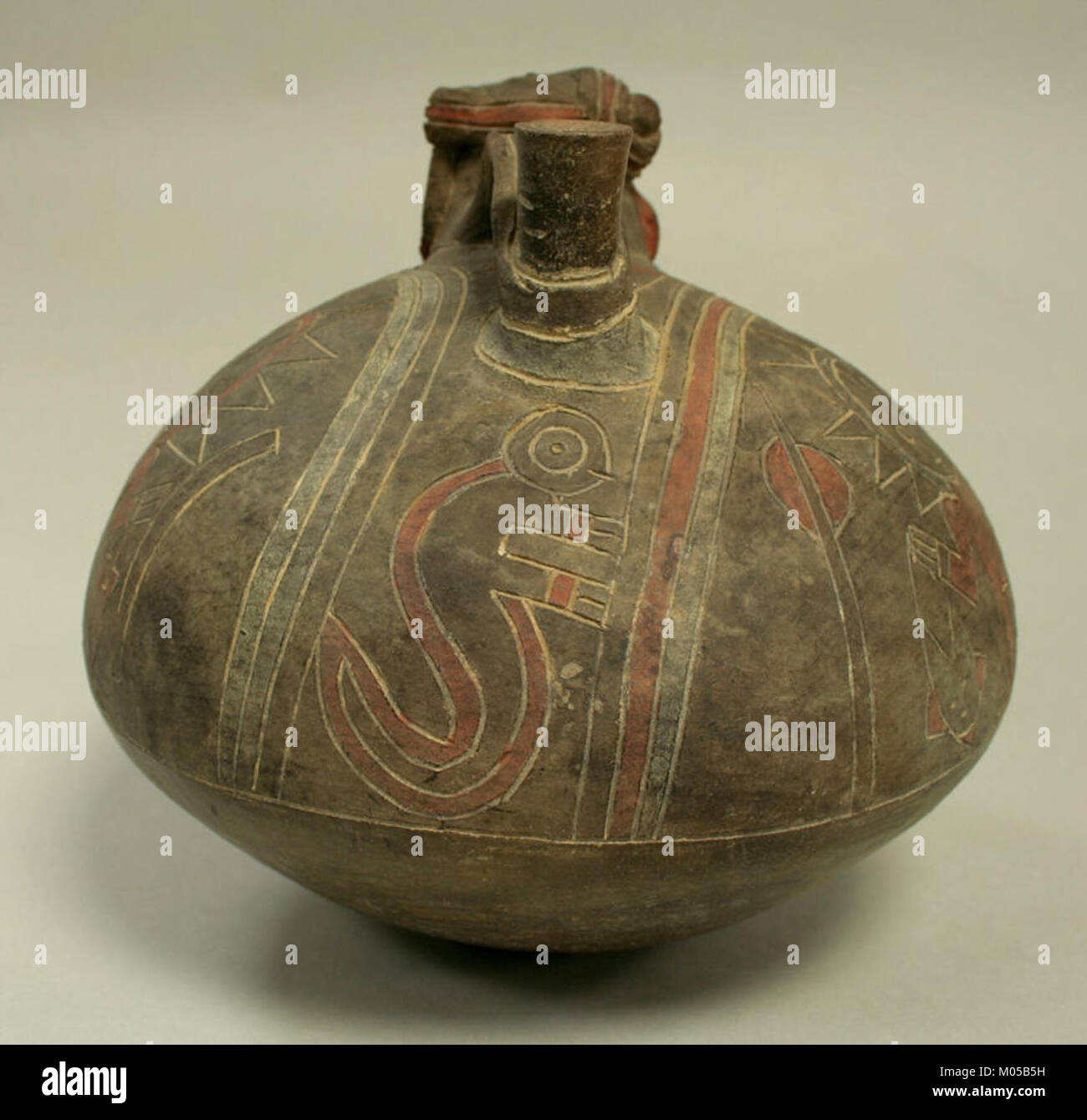 The 'Bridge and Spout Bottle' is a ceramic vessel from the 18th century ...