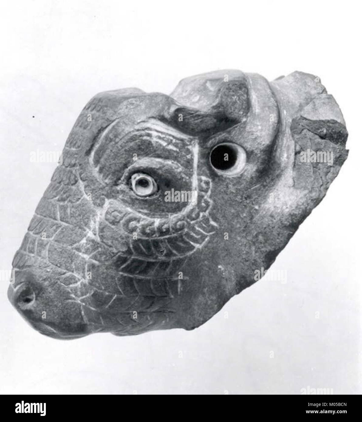 This bull head-shaped spout is part of a historical vessel, cataloged ...