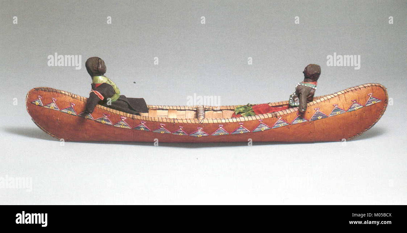 This model of a canoe, accompanied by dolls, is housed in the ...