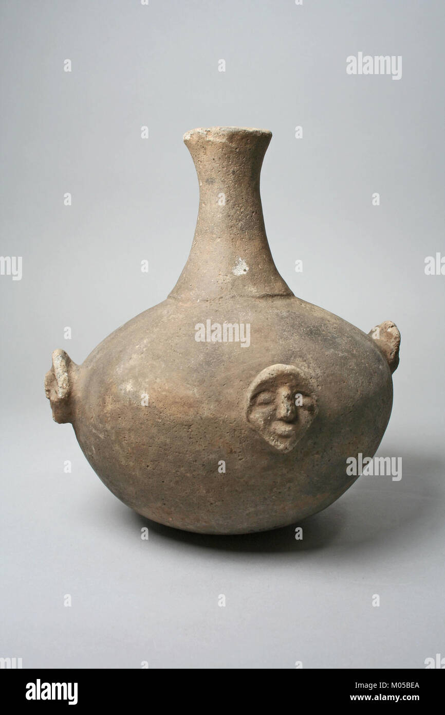 This bottle is an example of ancient craftsmanship, featuring raised ...