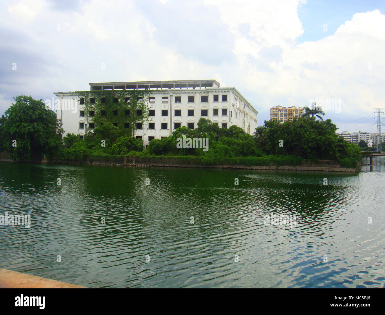 This image depicts a modern building on an island in Hongcheng Lake ...