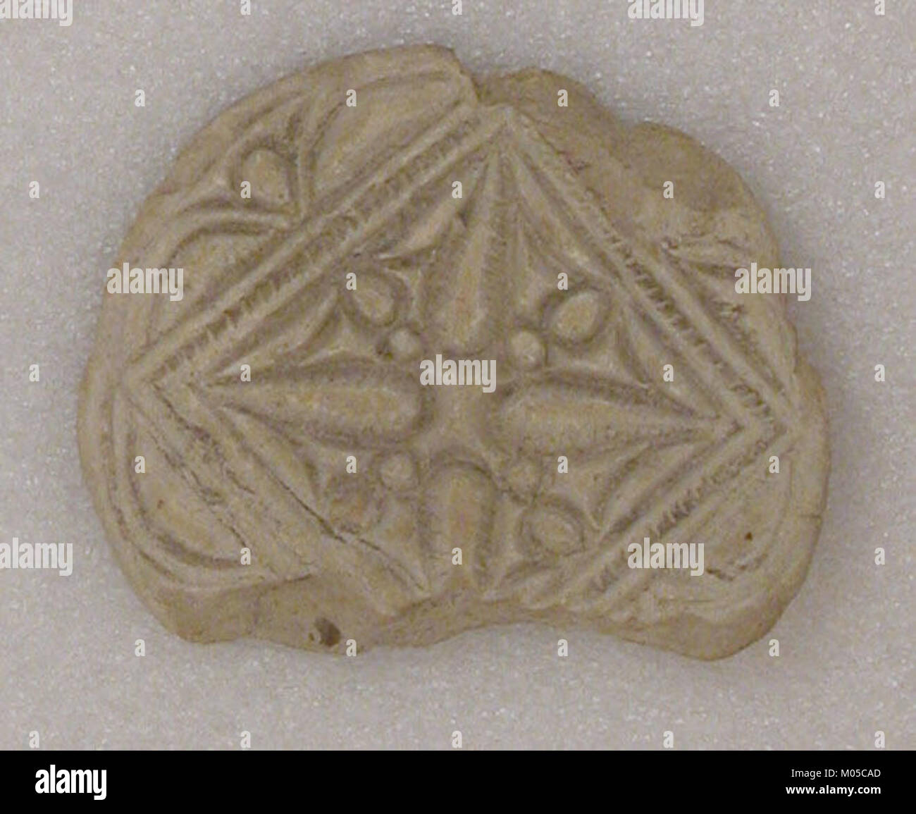 The Bread Seal MET sf27-138-1a is an ancient artifact housed in the ...