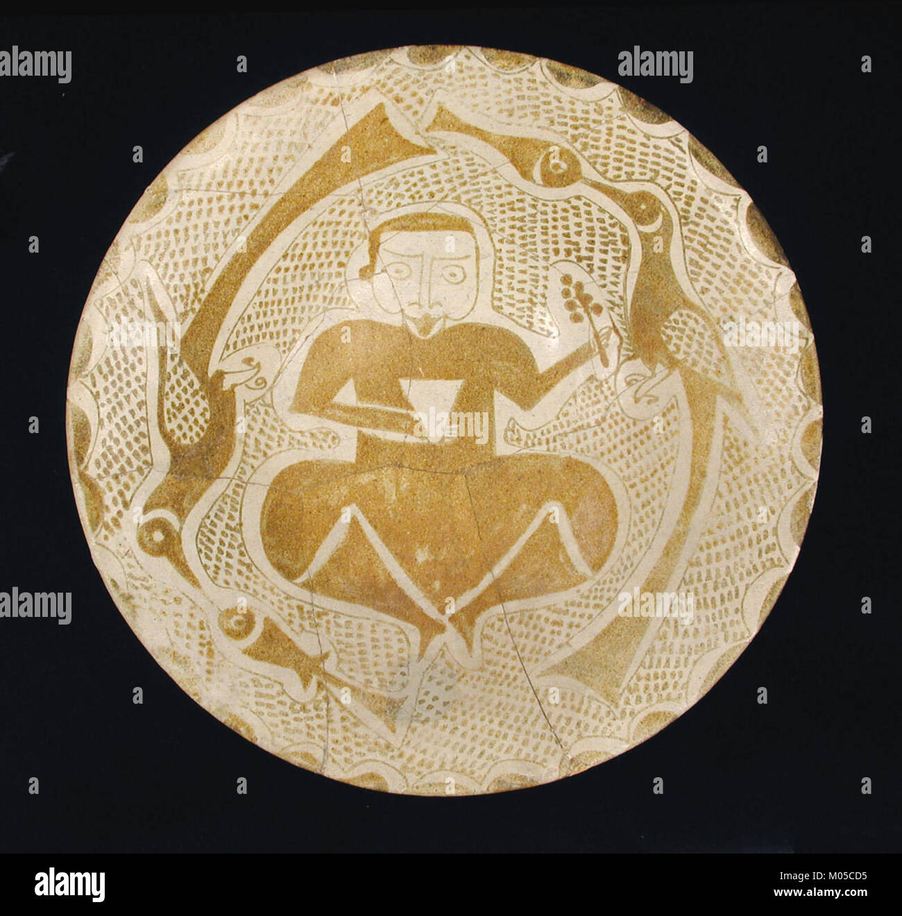 This ancient bowl, part of the MET collection, depicts a man holding a ...