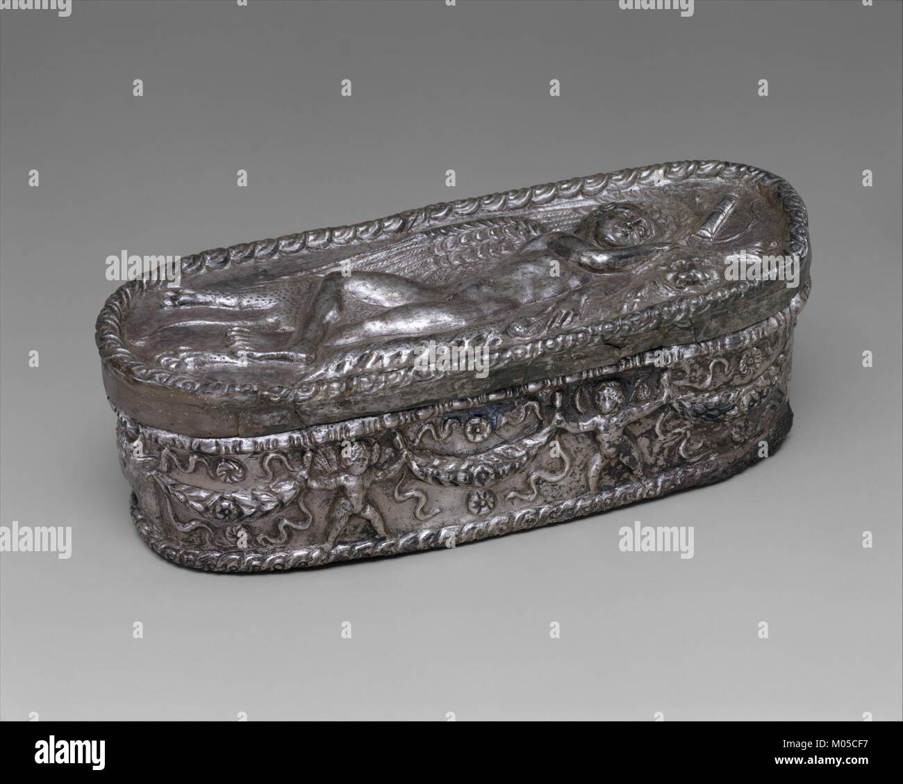 This box features a depiction of the mythological figure Eros, shown in ...