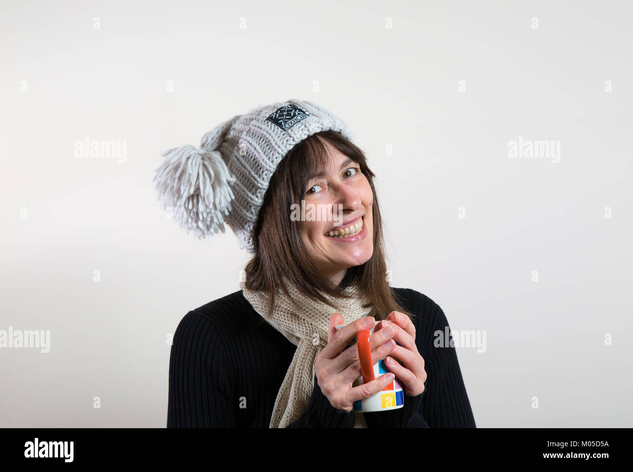 Front view portrait of attractive caucasian female in 30s, wearing ...