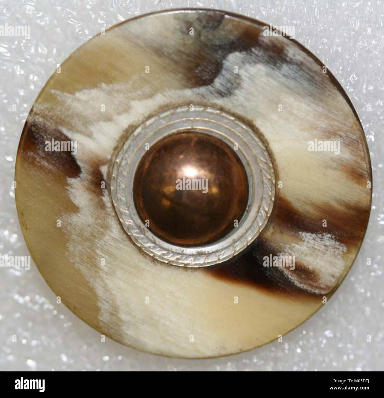 The Button MET 50.231.228 is a decorative object from the ancient world ...