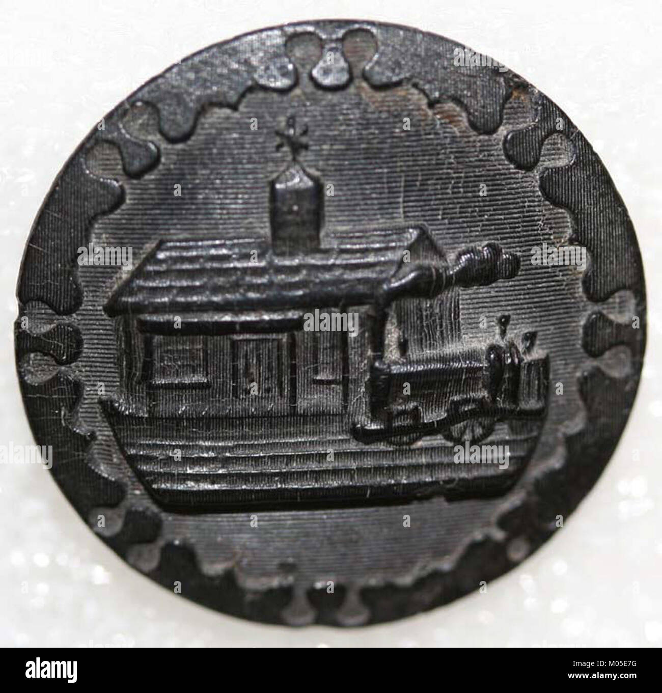 A historical button, cataloged as MET 51.47.1498, part of a collection ...