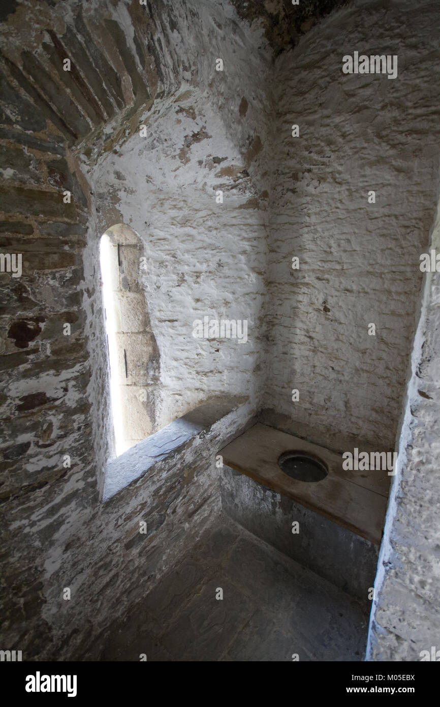 The inner gatehouse latrine at Caerphilly Castle, located in Wales, is ...