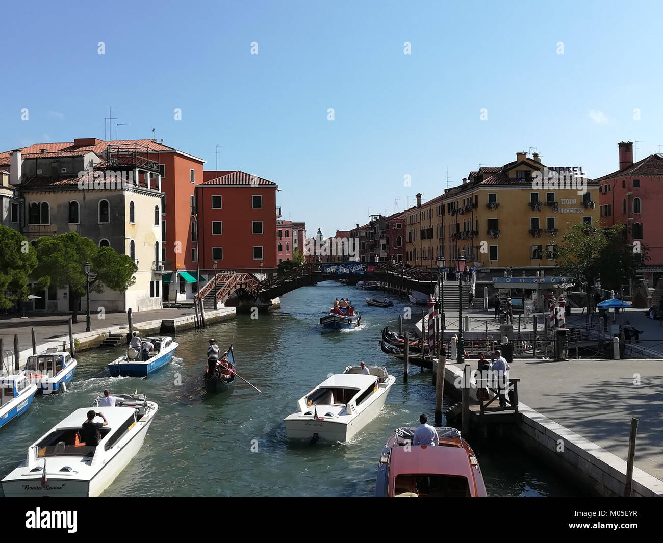 A photograph depicting a canal in Venice, capturing the iconic ...