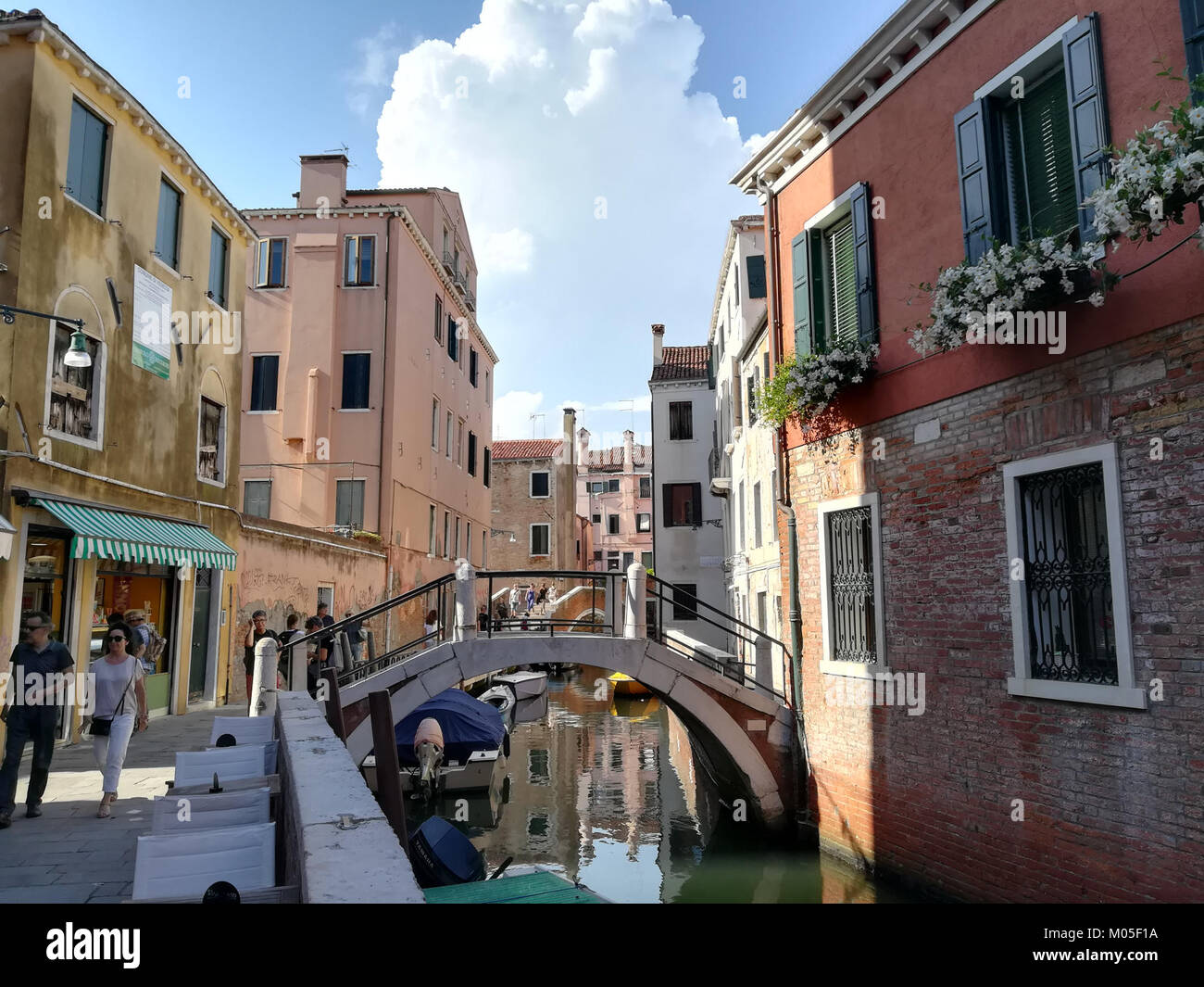 This photograph captures a canal in the Dorsoduro district of Venice ...