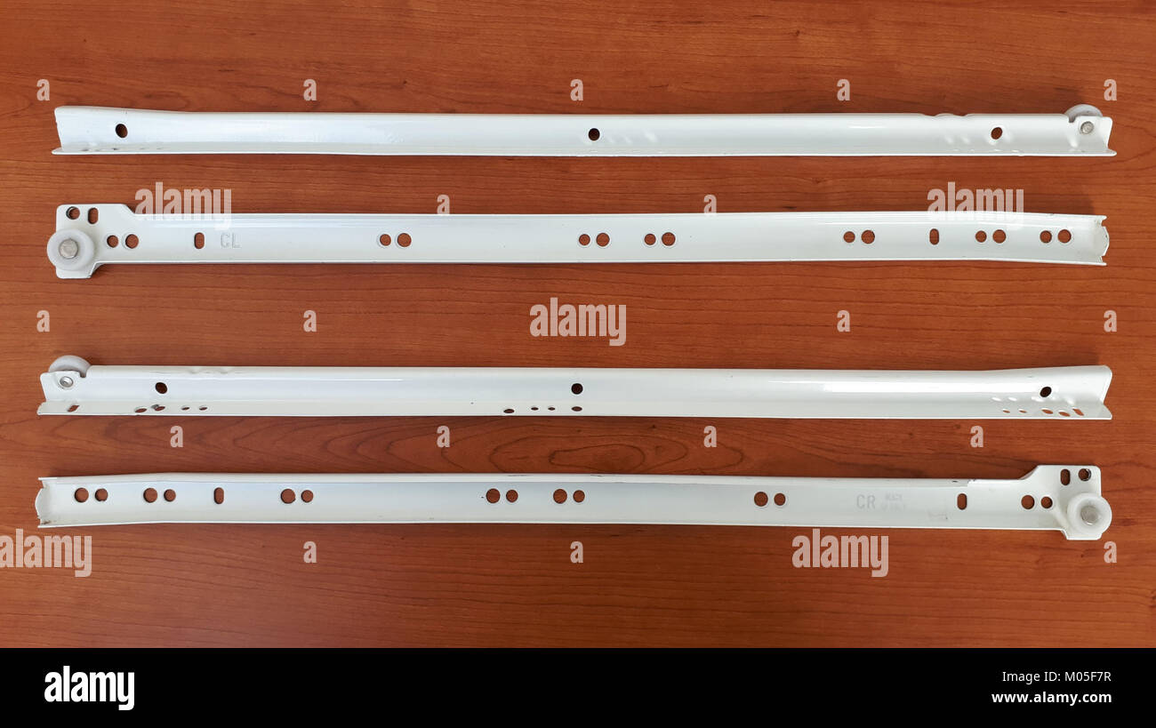 Bottom mounting wheel drawer slide rails, measuring 50 cm, are used for ...