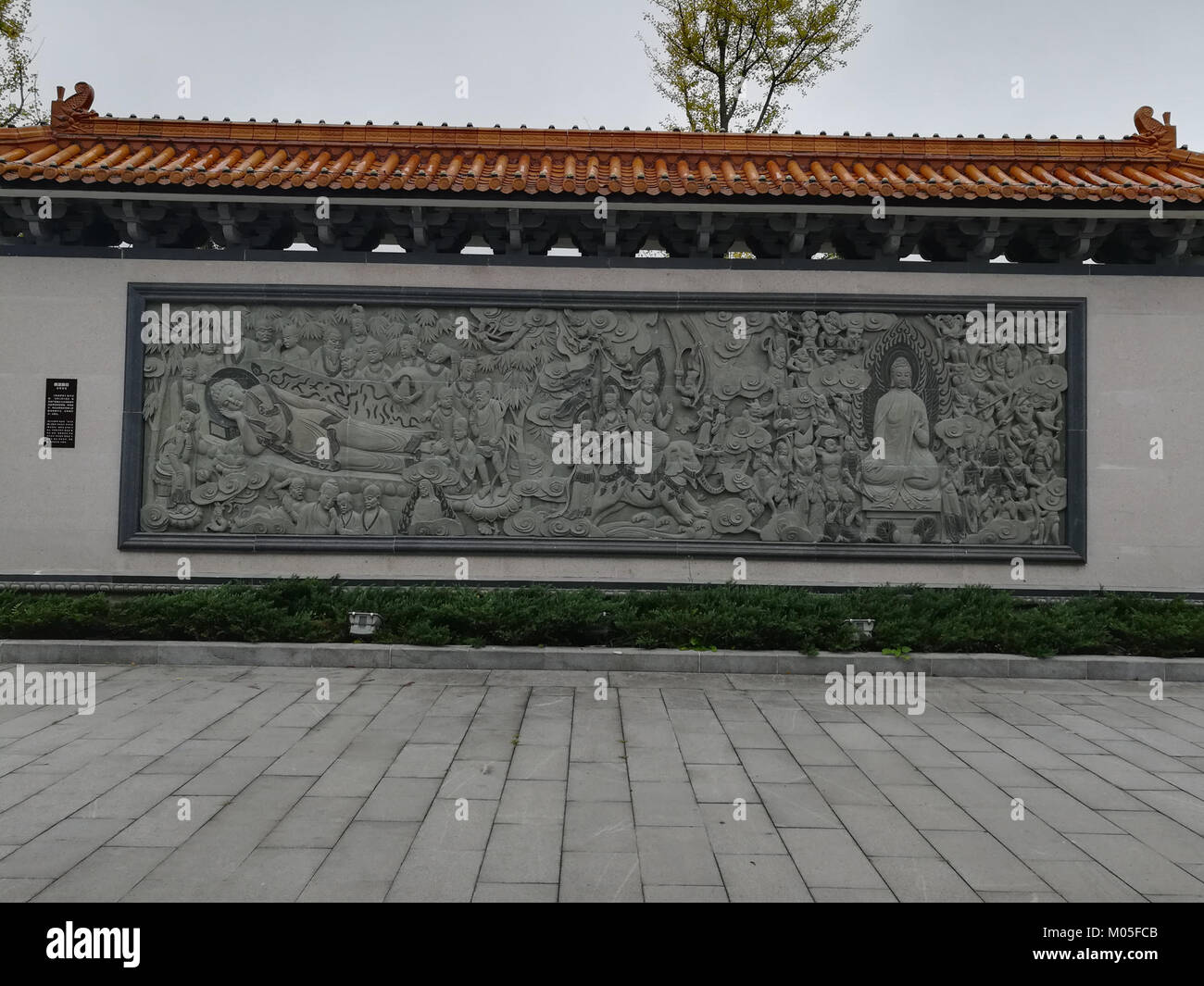 The Buddha relief wall at Miyin Temple is a significant cultural and ...