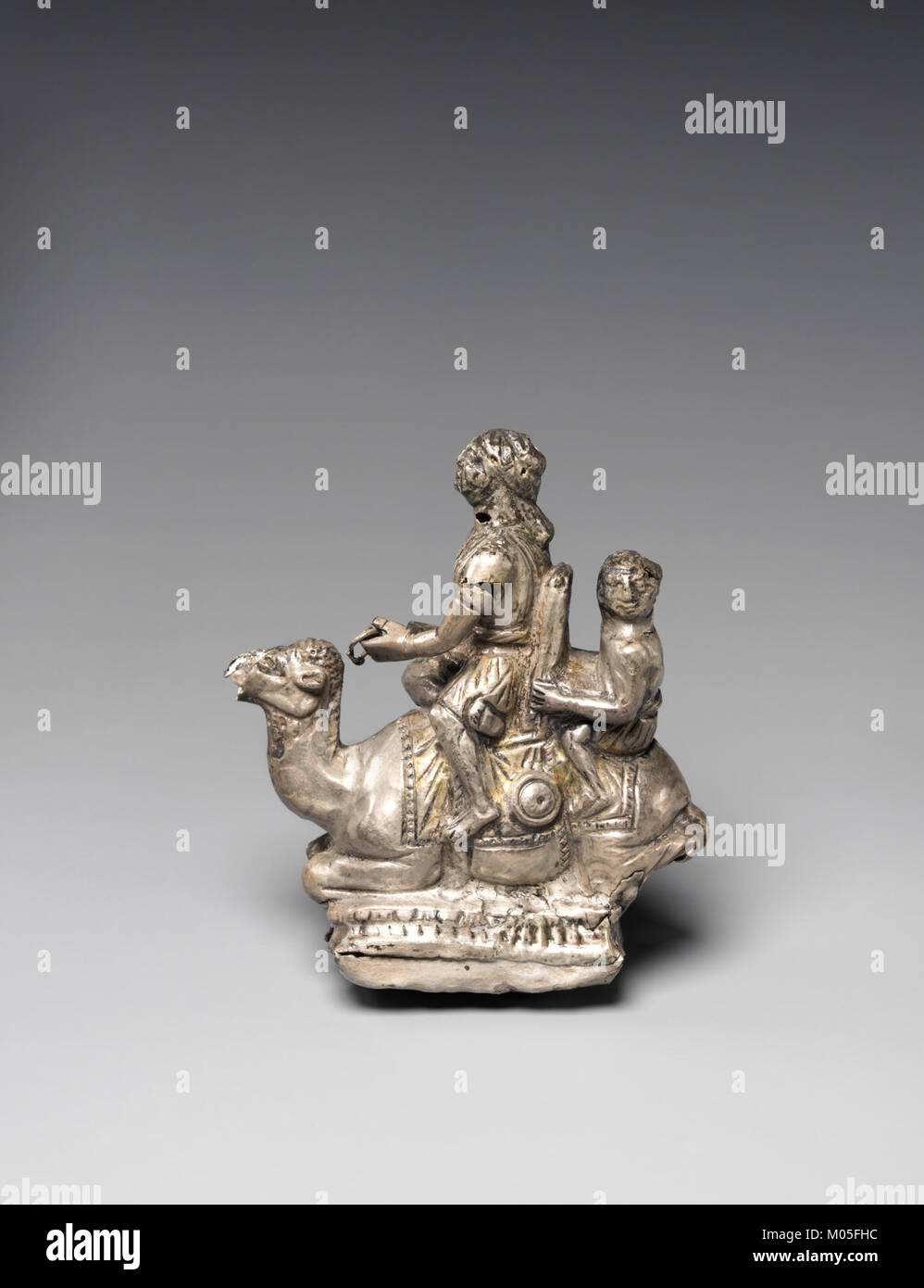 A historical depiction of a camel and riders, part of the Metropolitan ...