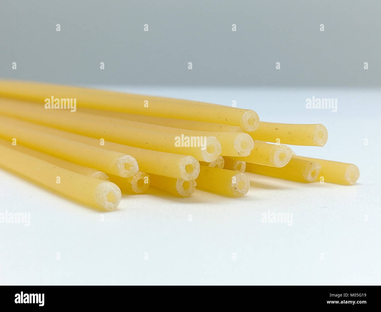 Bucatini is a type of Italian pasta known for its tube-like shape ...