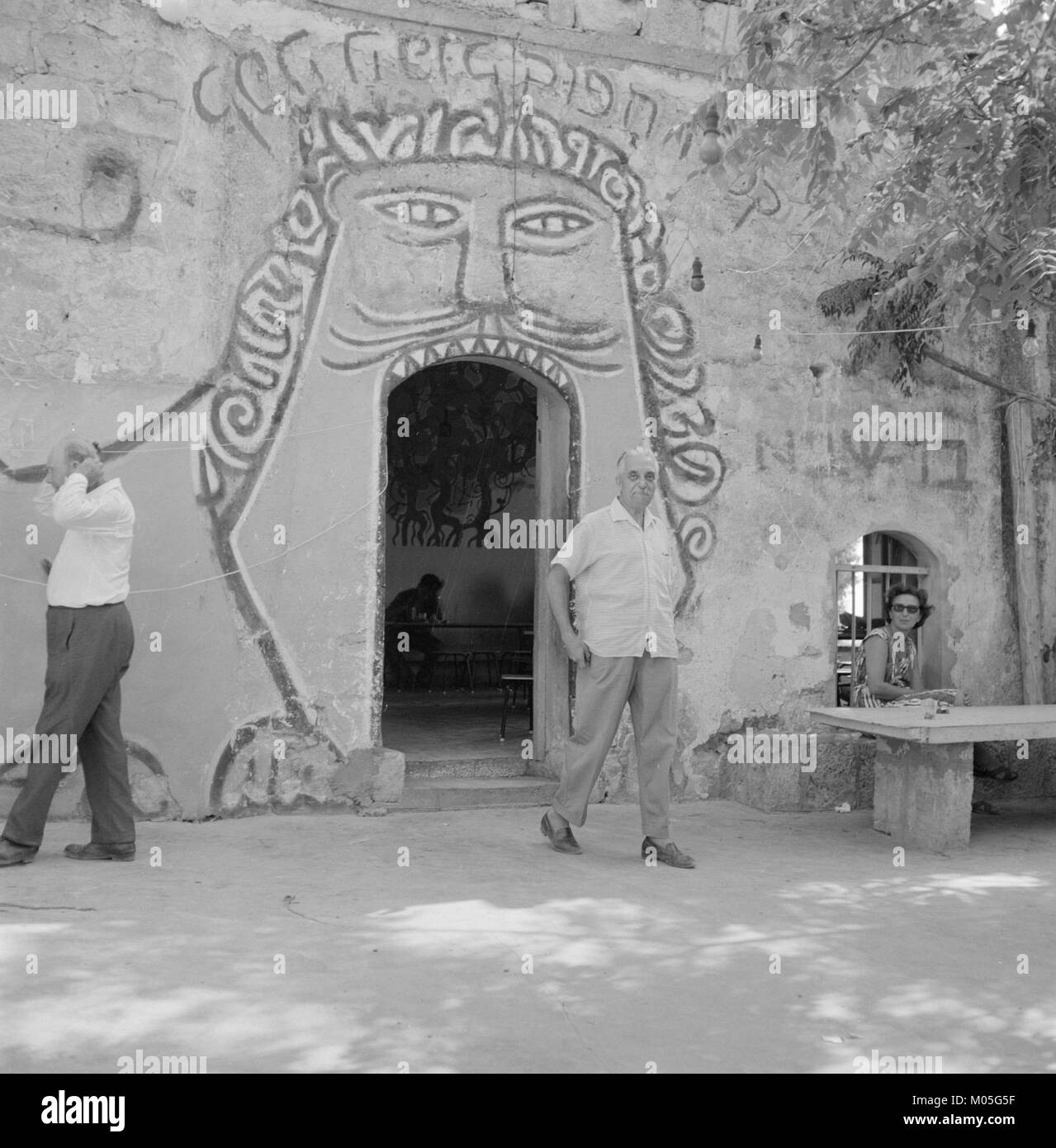 The photograph captures Mayor Marcel Janco leaving a painted entrance ...