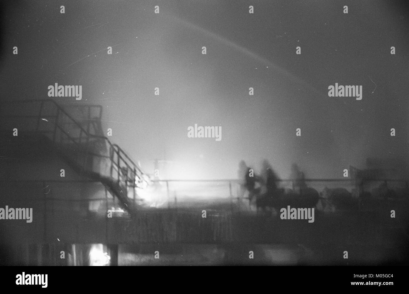 This image depicts the fire on the tanker Diana at Mobil Oil, showing ...