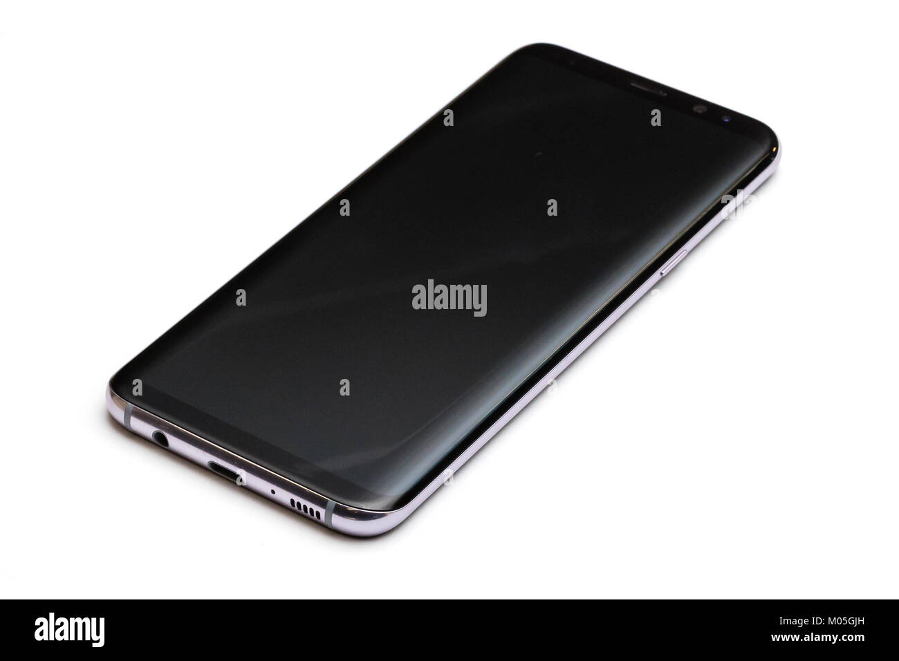 Black new smart phone isolated on white background for mockup. Angle ...