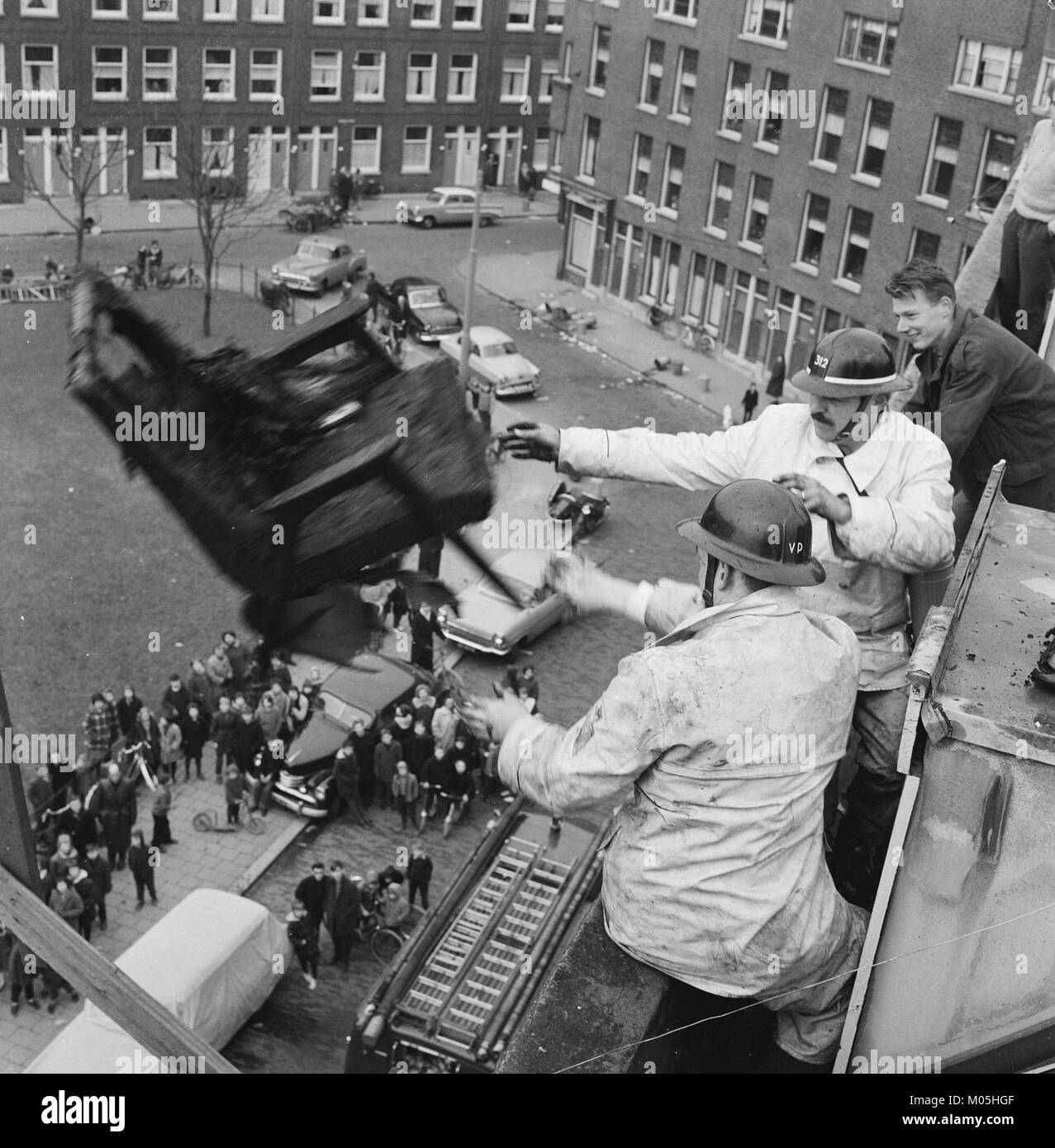 This image depicts a fire in Haringpakkerstraat, Rotterdam. It captures ...