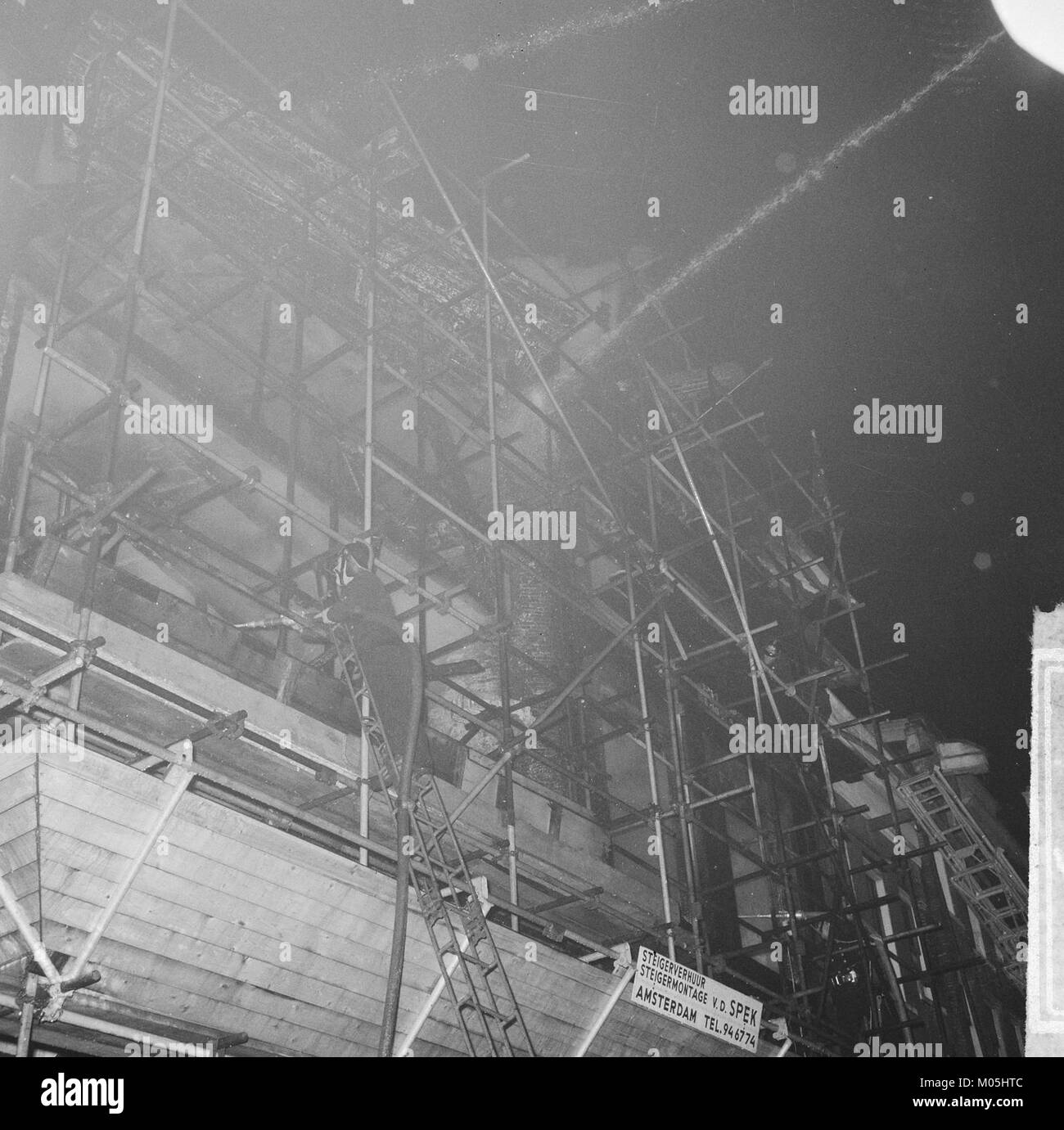 This image shows a fire on Nieuwendijk street in Amsterdam, with a ...