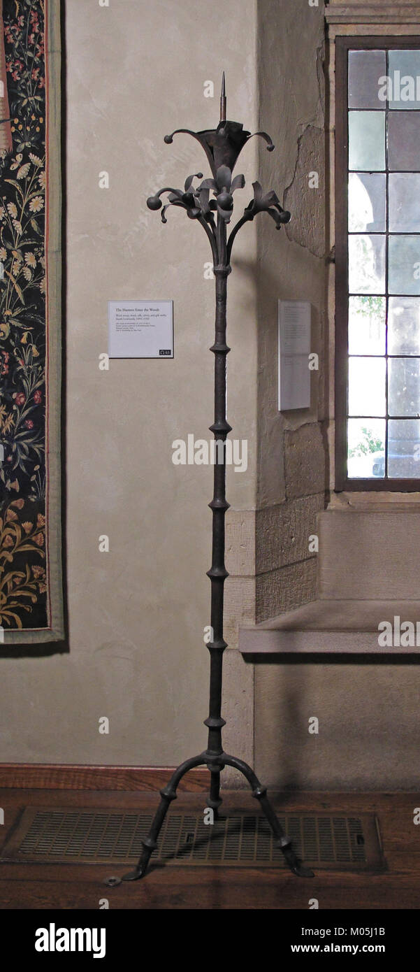 This candelabra, part of the MET collection (cdi41-190-33), is an ...