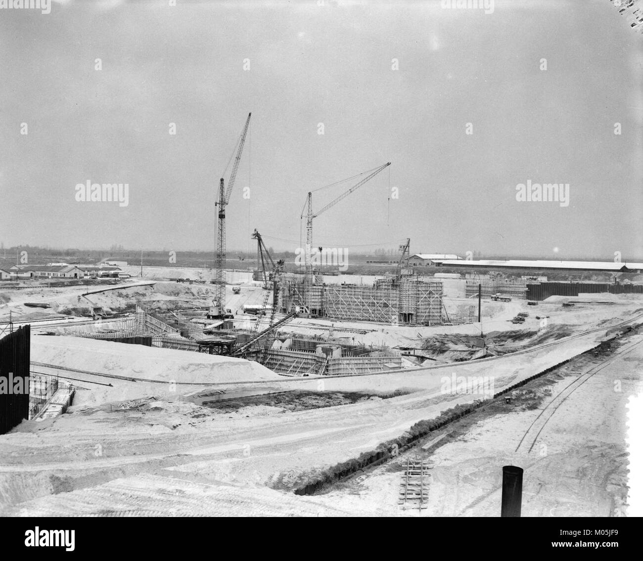 This image shows the construction of the Hagestein dam complex, located ...