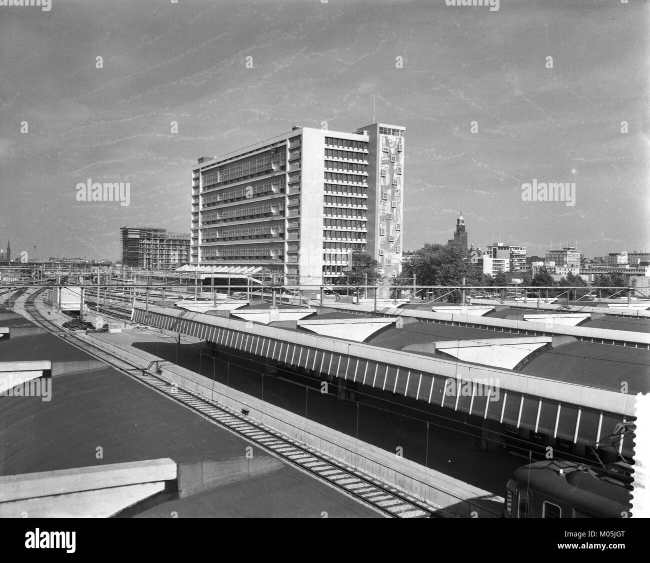 This photograph depicts the construction of a post office station in ...