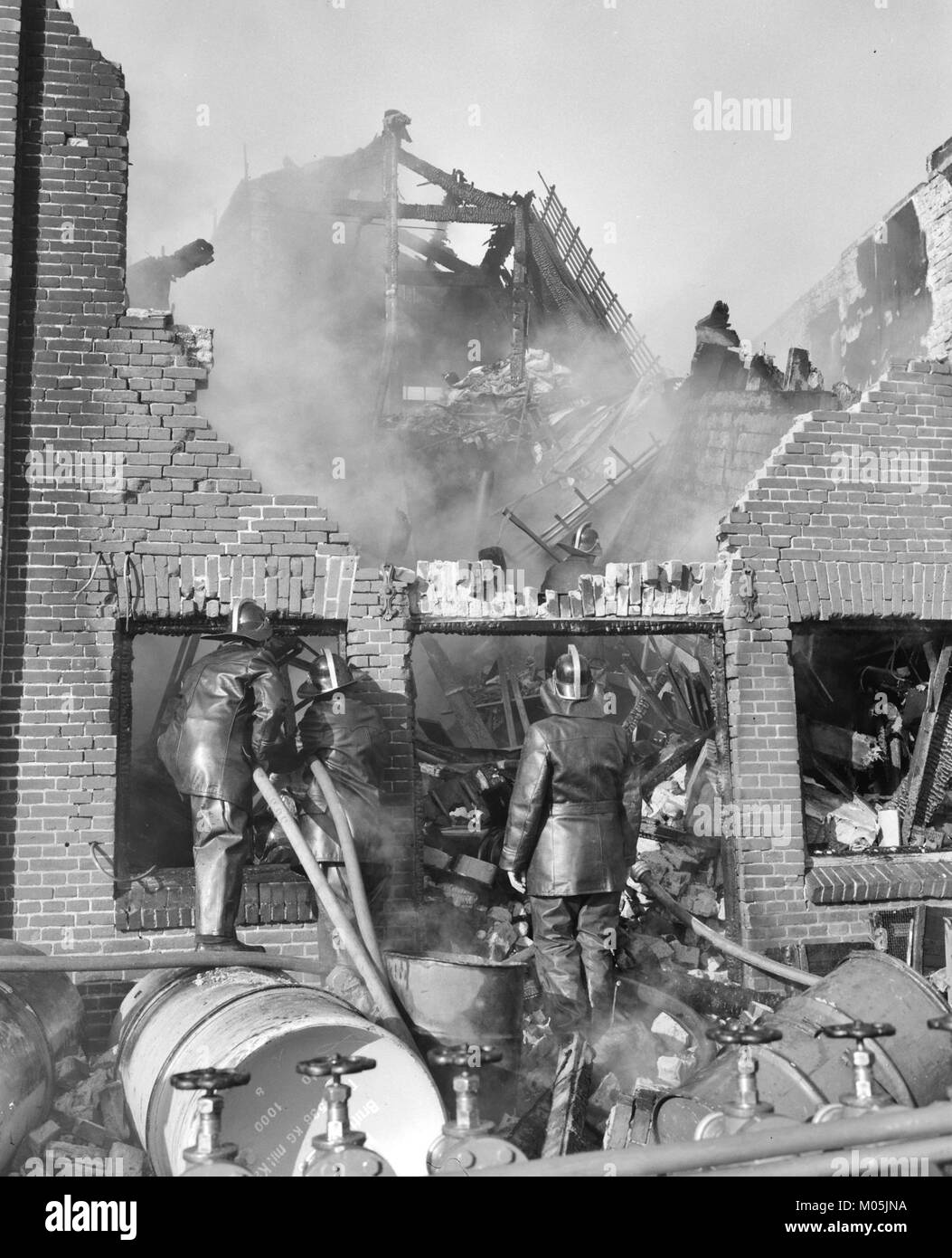 Factory on fire Black and White Stock Photos & Images - Alamy