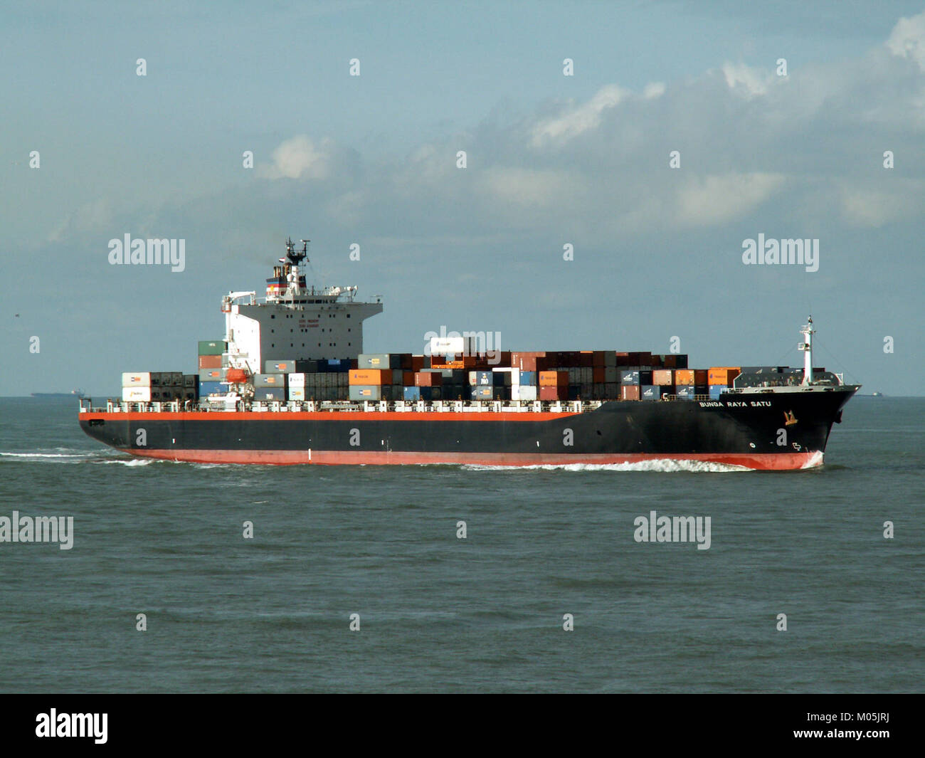 The image shows the 'Bunga Raya Satu p2,' a vessel approaching the Port ...