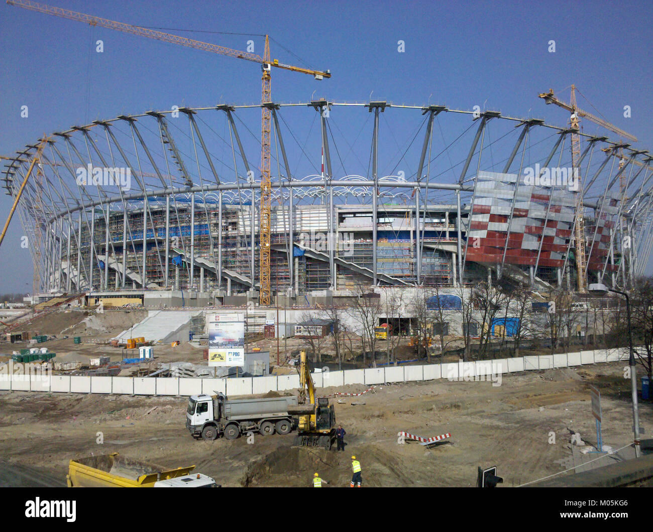 This image documents the construction of the National Stadium in Poland ...