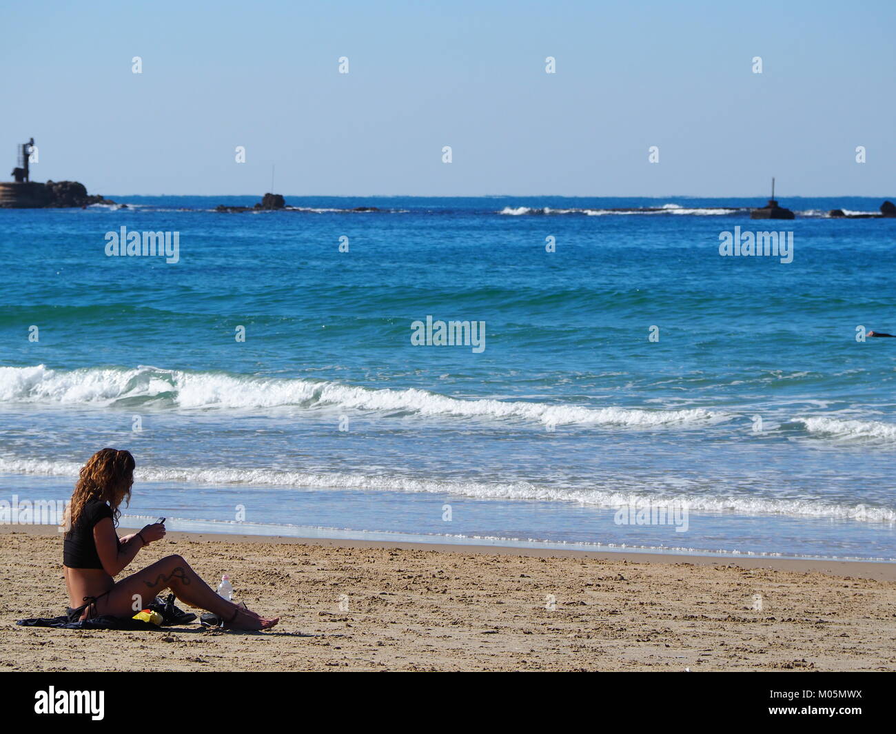 Woman lying in the sun hi-res stock photography and images - Alamy
