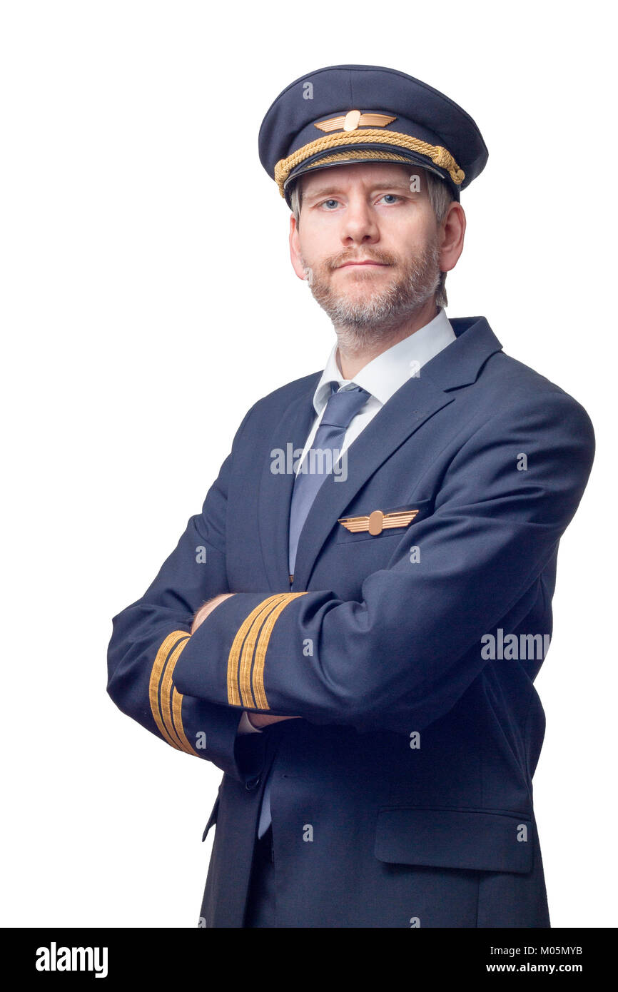 Pilot in uniform with golden stripes and cap crossed his arms Stock ...