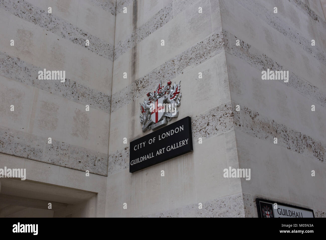 City of London coat of arms and Guildhall Art Gallery sign Stock Photo ...