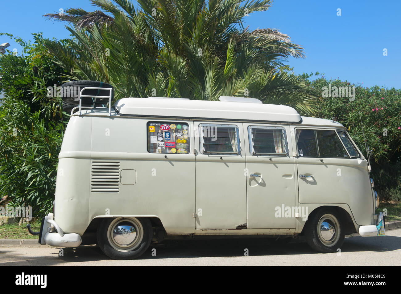 Old Volkswagen bus on the road Stock Photo - Alamy