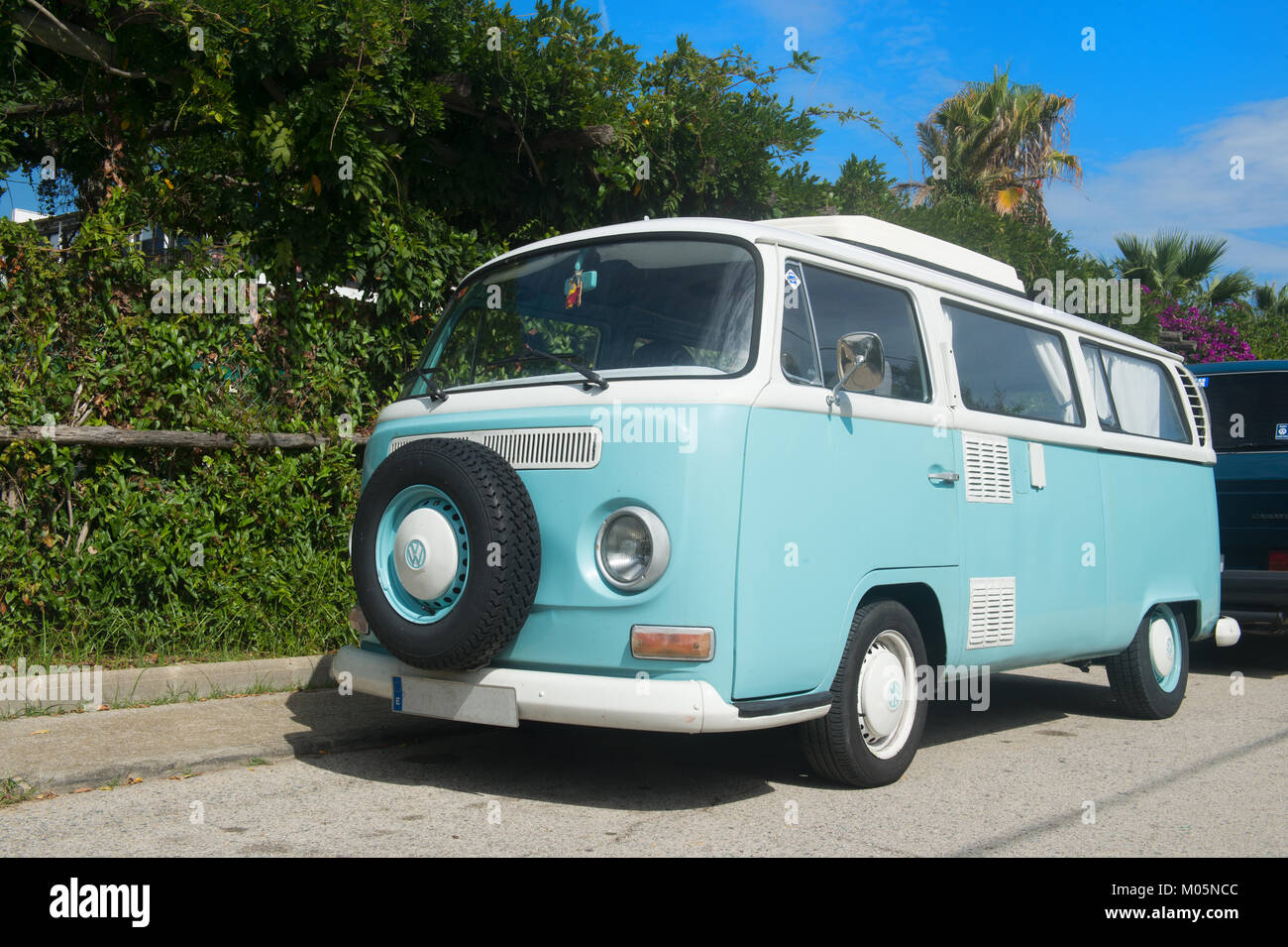 Old Volkswagen bus on the road Stock Photo - Alamy